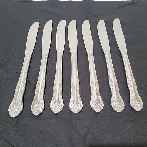 Source Unknown | Dining | 7 Pc Dinner Knives Rose With Scroll Edge ...
